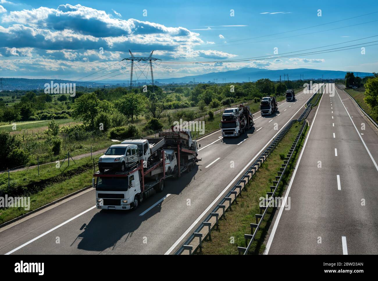 Fleet of car carrier trailers, known variously as a car-carrying ...