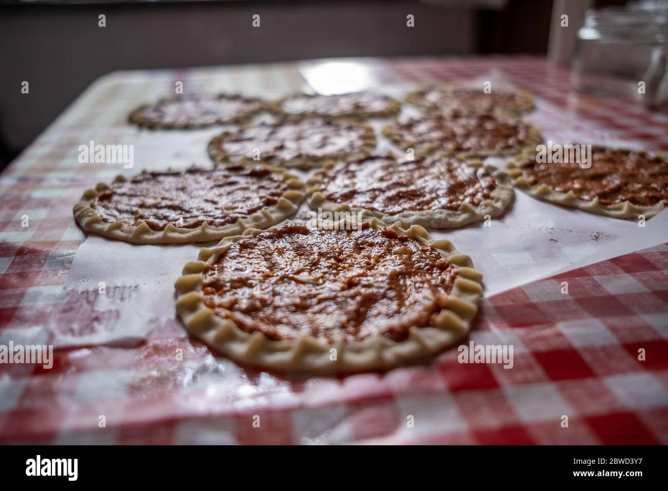Top view of homemade pide, turkish flatbread with ground meat, mini ...