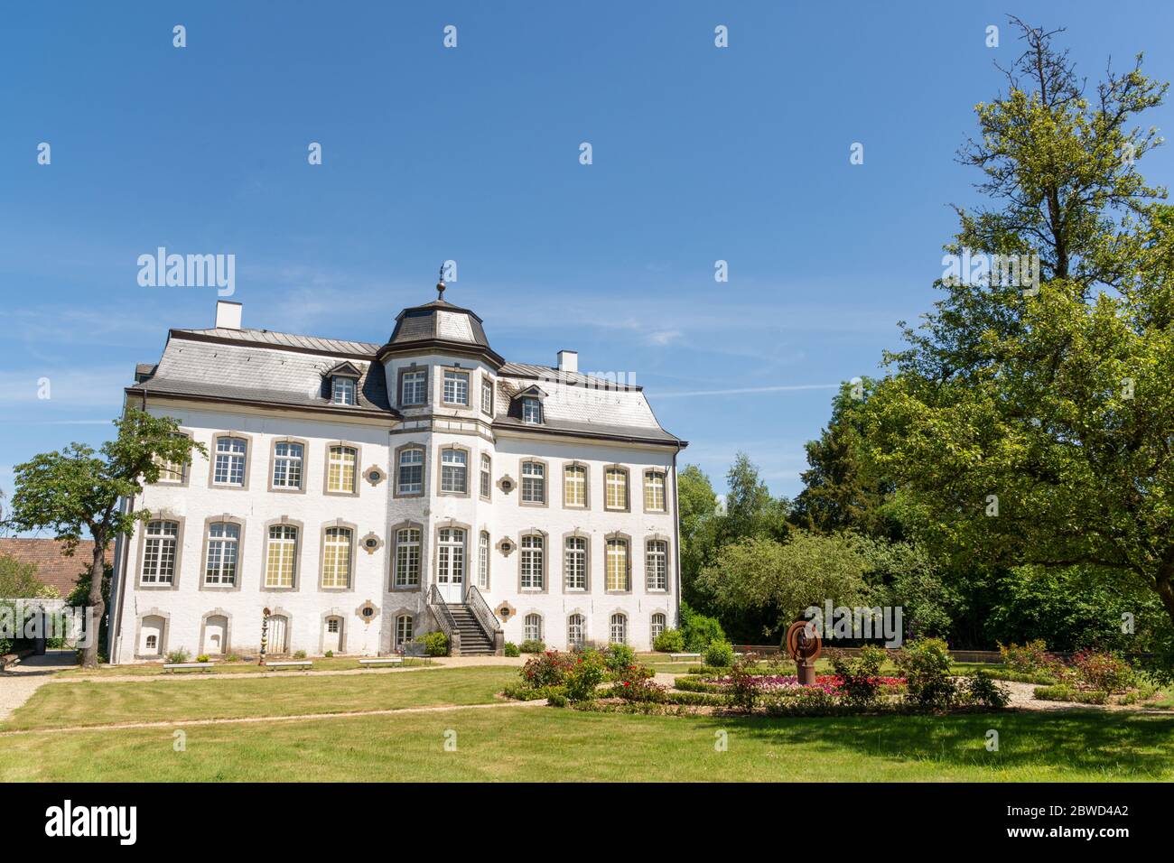 Übach-Palenberg, Germany - May 31, 2020: Zweibrüggen Castle and garden ...