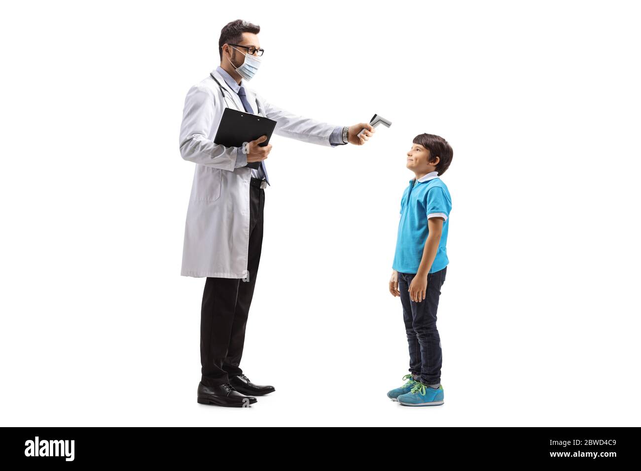 Full length profile shot of a male doctor measuring a temperature to a ...