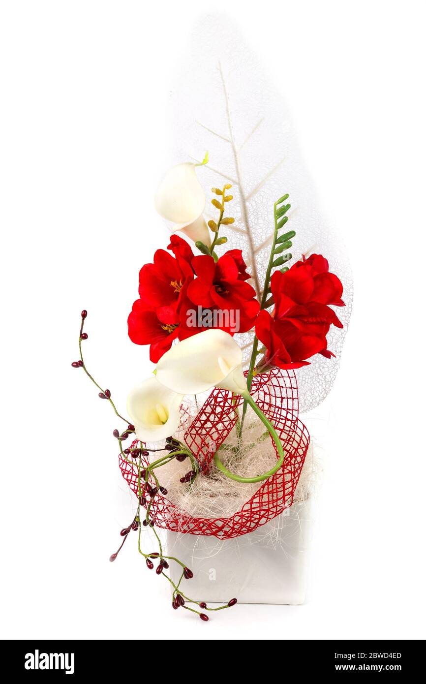 Composition with artificial flowers in a pot isolated on white ...
