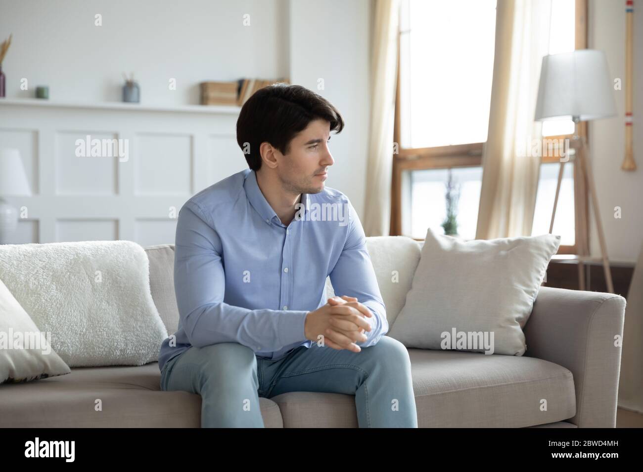 Focused young man thinking idea hi-res stock photography and images - Alamy