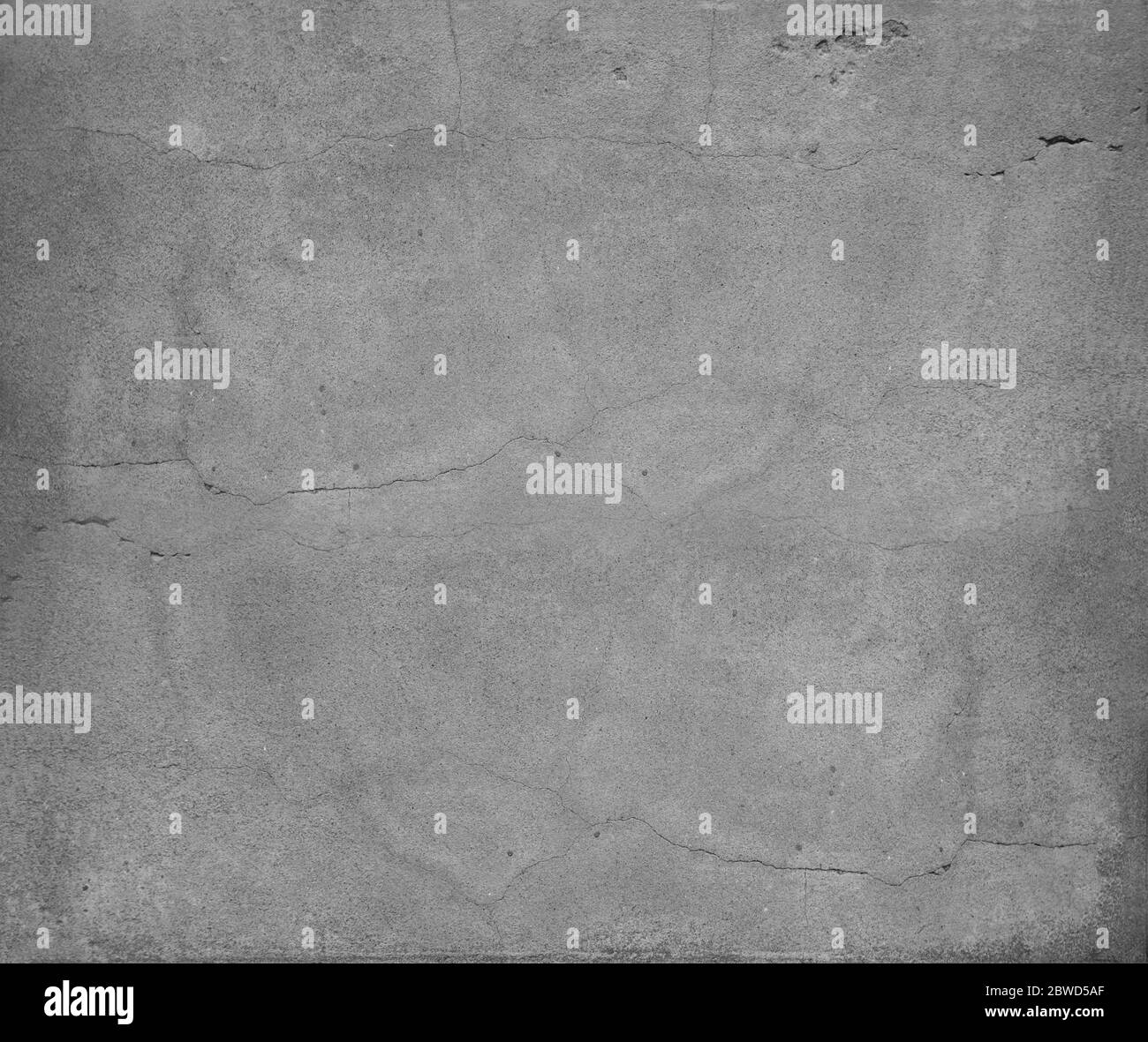 Close-up of cracks in grey concrete Stock Photo - Alamy