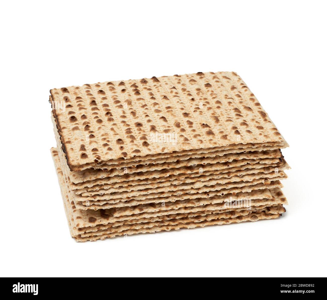 stack of baked matzoh isolated on a white background. Pesah celebration ...