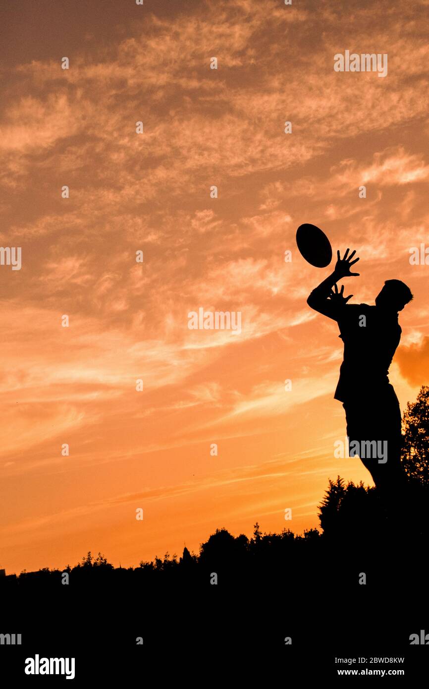 Rugby training at sunset Stock Photo - Alamy
