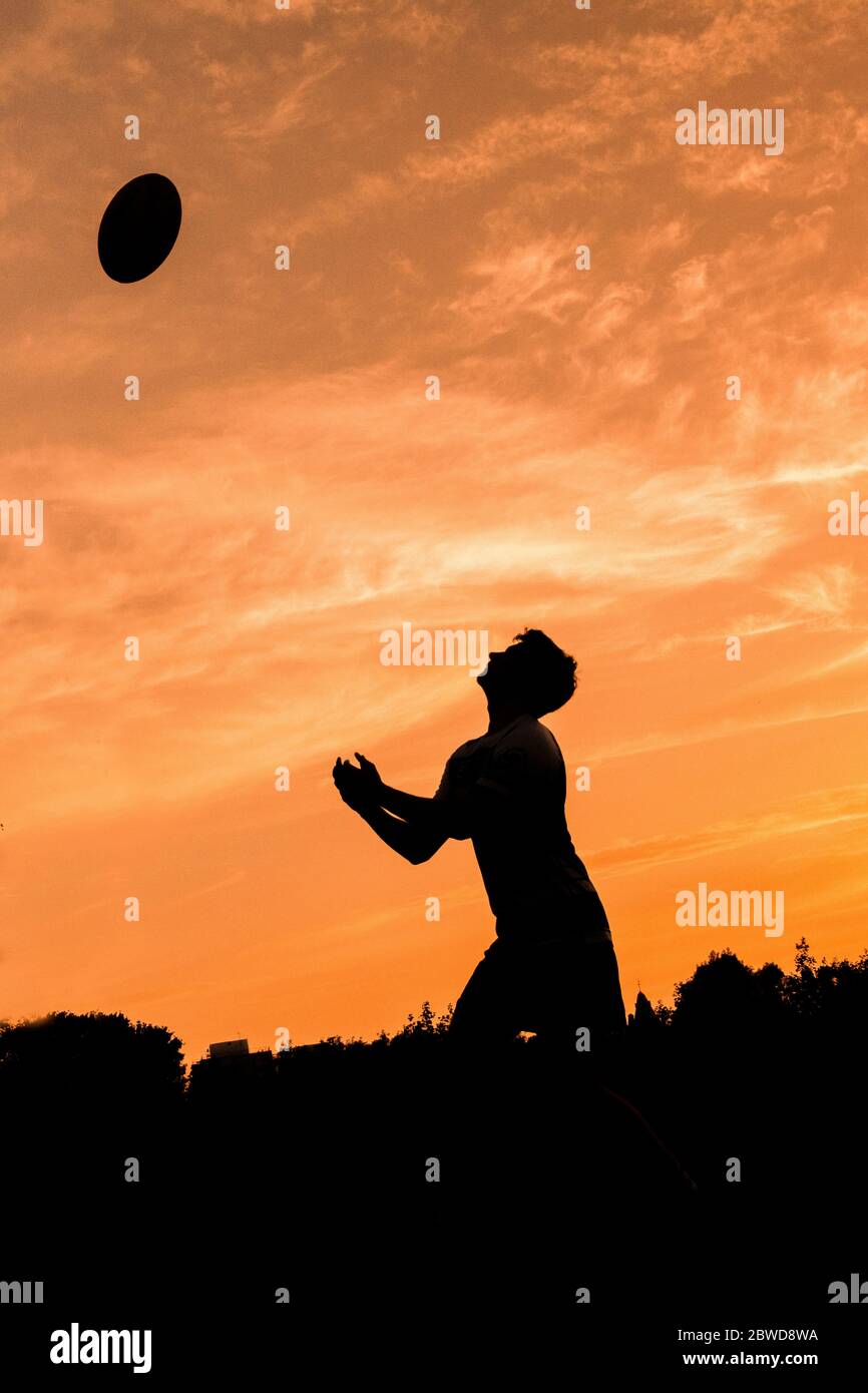 Sunset football field silhouette hi-res stock photography and images ...