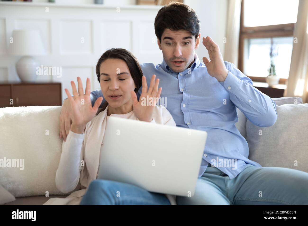Caucasian couple using laptop frustrated by computer problem Stock ...
