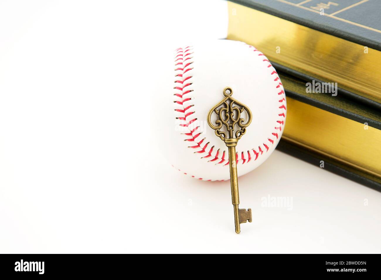 Books, baseball, and key symbols combine to reflect sports as key to ...