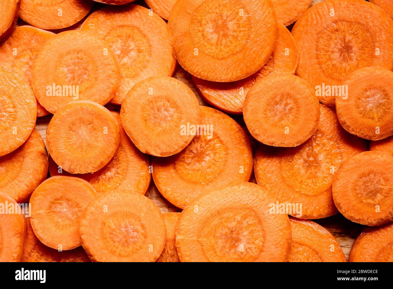 top view of fresh ripe carrot slices background Stock Photo - Alamy
