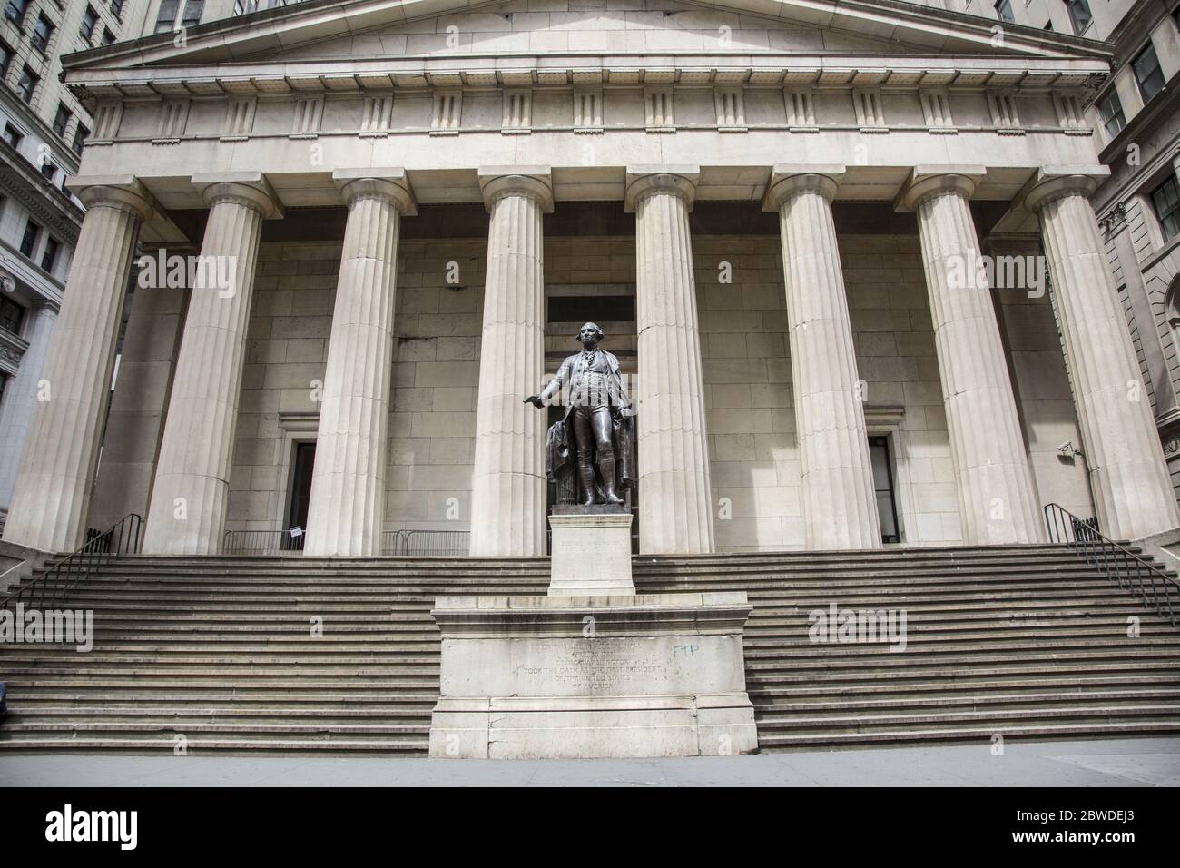 George Washington stands alone in front of the original Federal Hall on ...