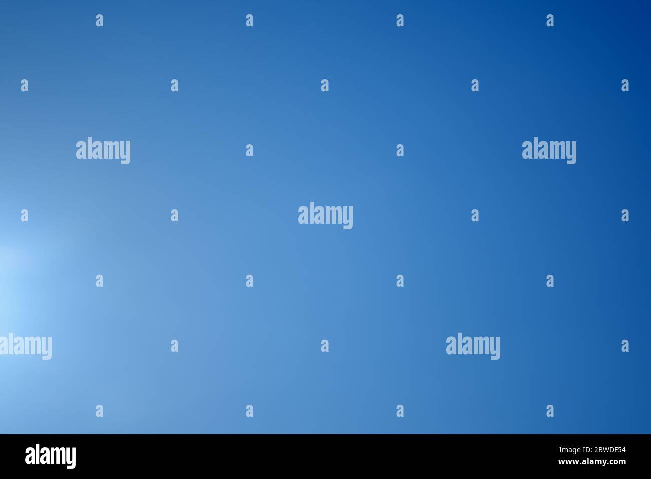 Natural blue sky gradient with soft sun rays. Sunny summer sky ...