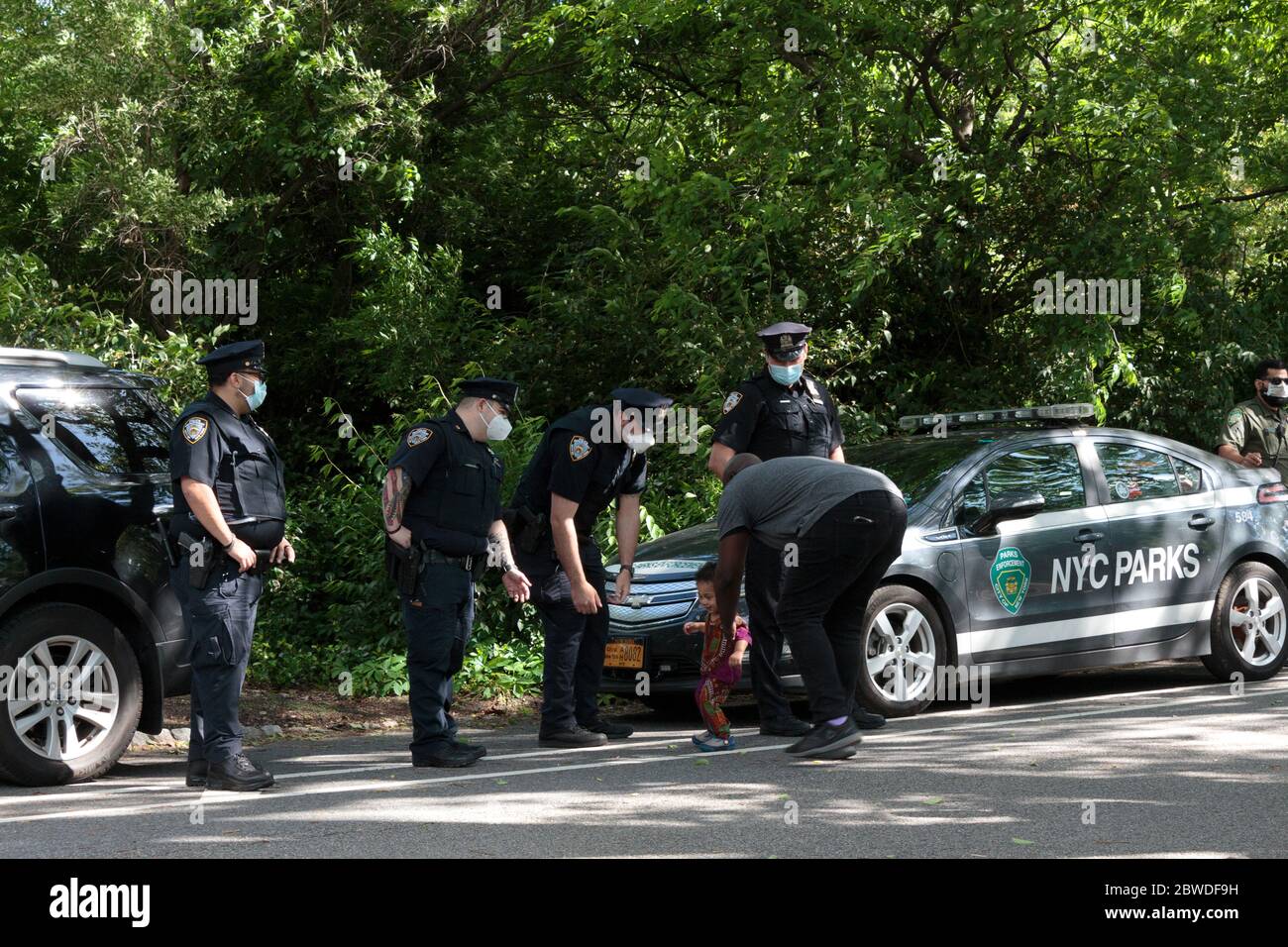 African american police with masks hi-res stock photography and images ...