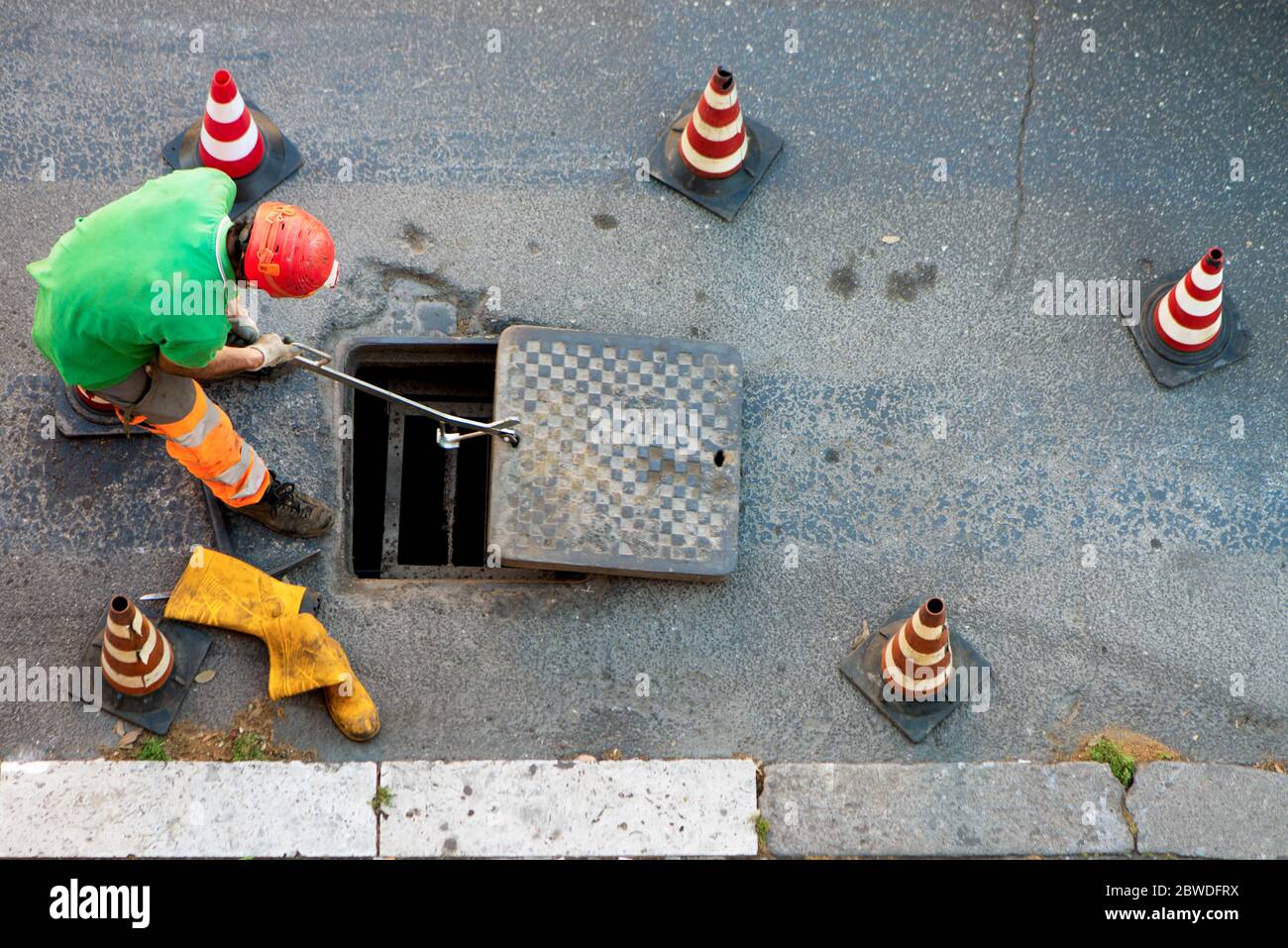 sequence of worker going in the manhole in the street, step 1 to 9 ...