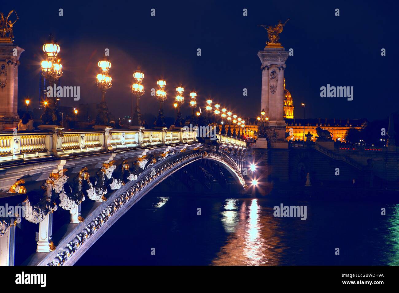 arched bridge Alexandre in Paris illuminated in the night Stock Photo ...