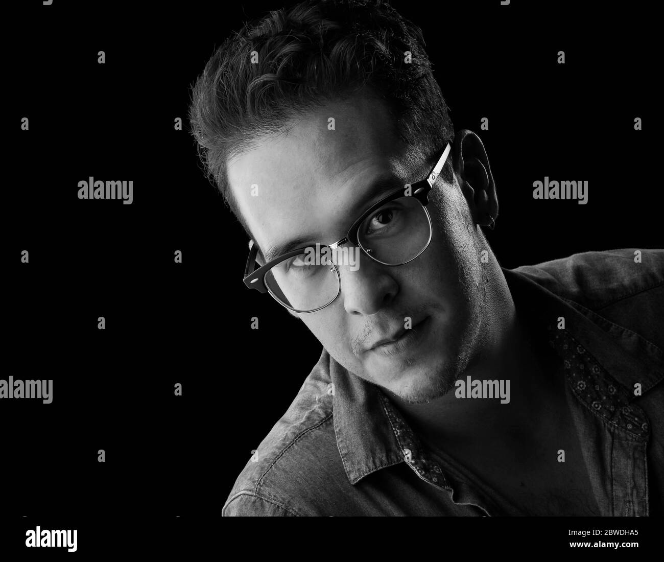 intellectual male wearing eyeglasses as black and white portrait Stock ...