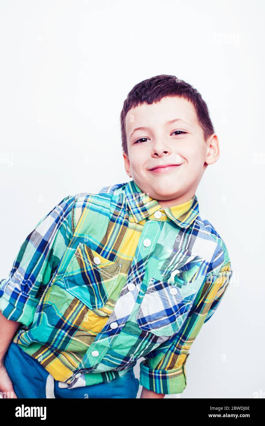 little cute real boy on white background gesture smiling close up ...