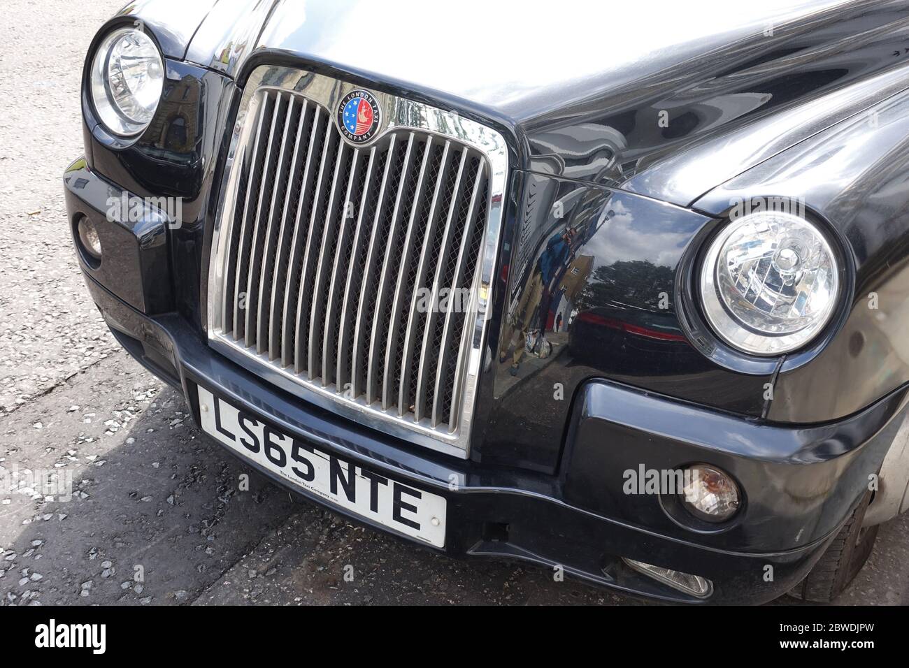 LONDON, UK -16 MAY 2020- A black British Hackney Carriage taxi cab on ...
