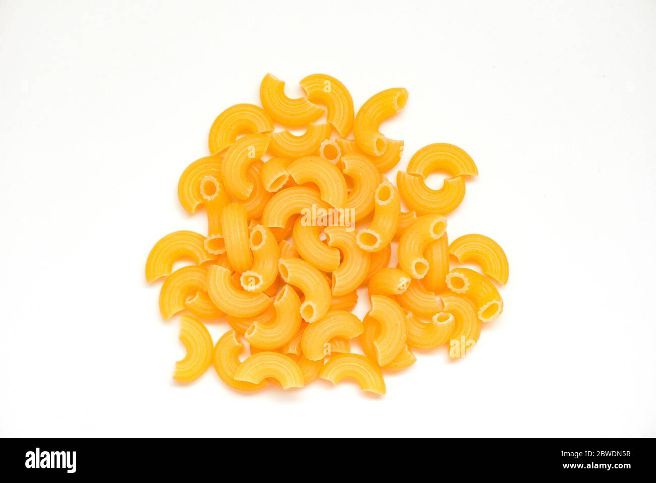 macaroni top view on white background / close up raw macaroni uncooked ...