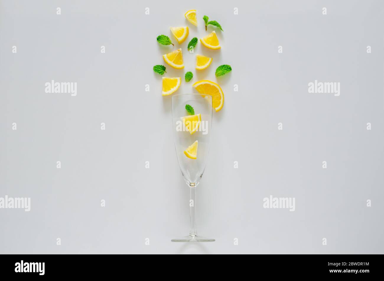 Creative lemonade drink that have slice lemon and mint leaves with ...