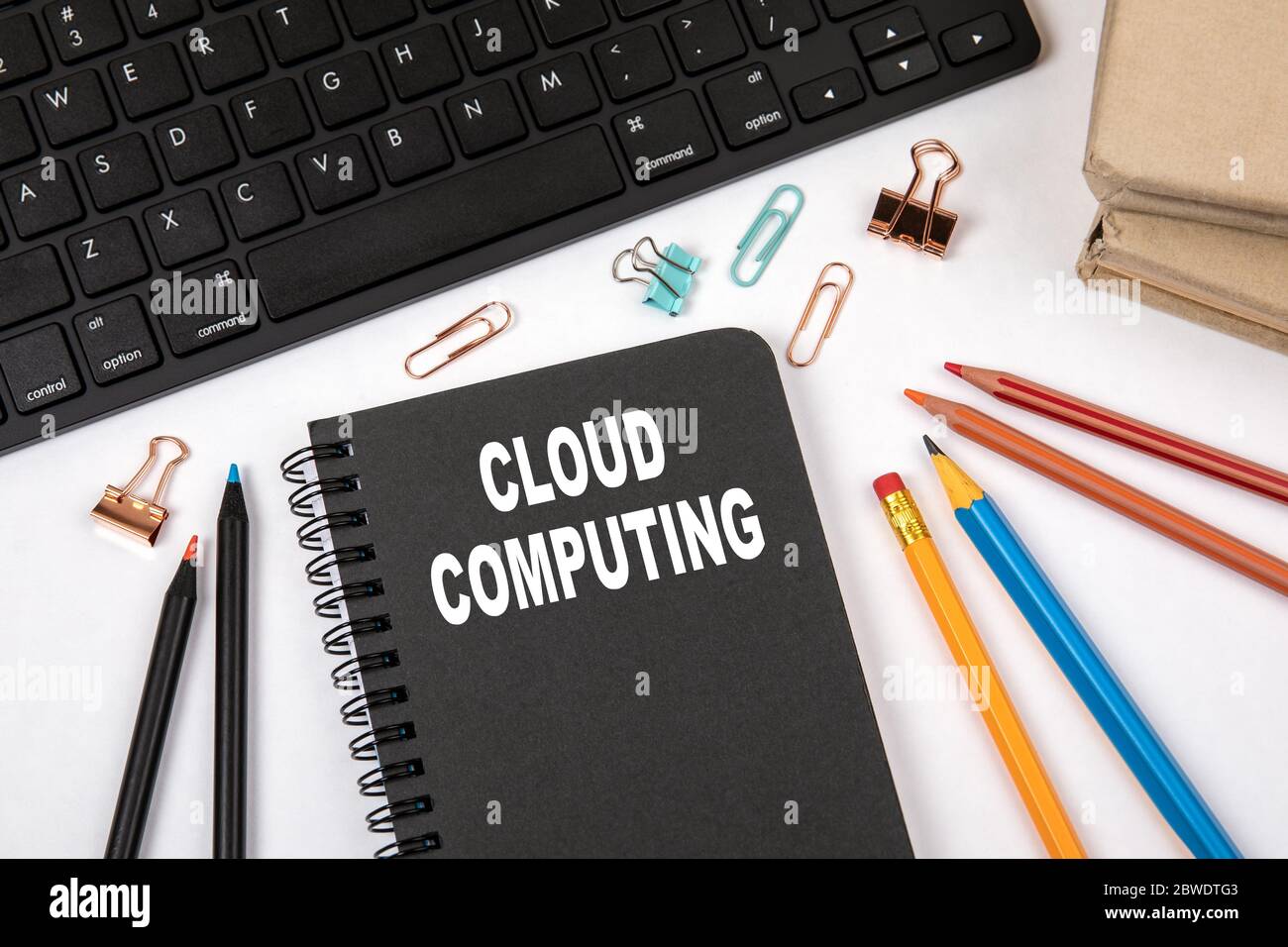 Cloud Computing Concept Black Notebook And Computer Keyboard On A