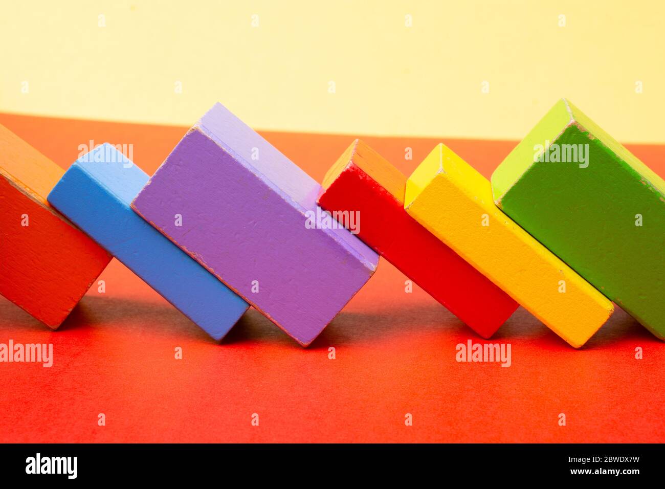 Different color and shape wooden toy building blocks Stock Photo - Alamy