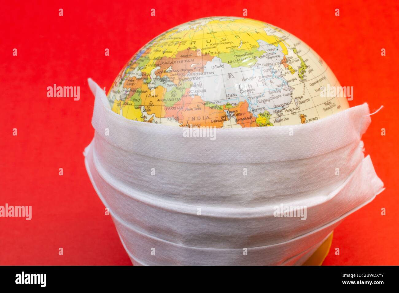 Planet Earth with face mask. World medical concept Stock Photo - Alamy
