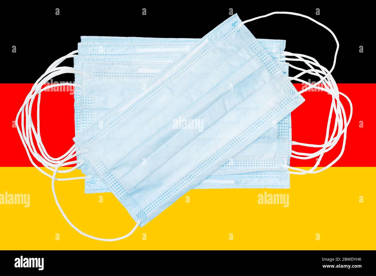 Group protective medical surgical face masks on background colors flag ...