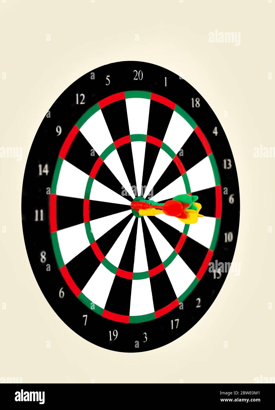 Many perfect shots of darts at the target darts of different colors ...