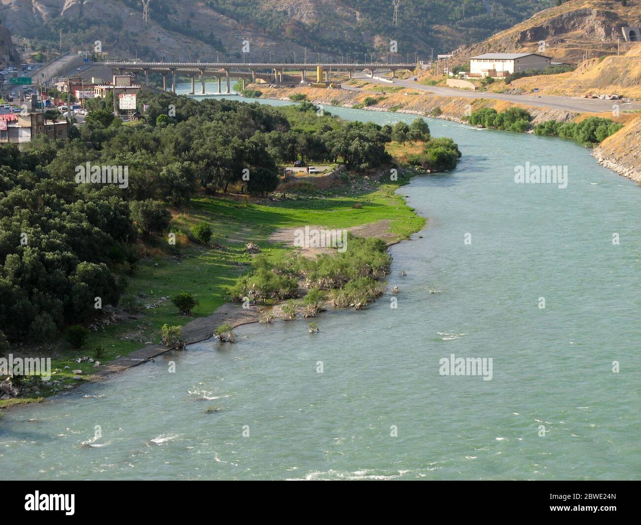 Crossing the Sepidrood River through the city of Rudbar in Iran. The ...