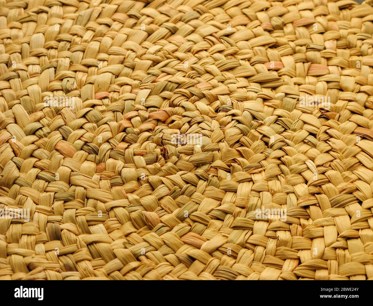 Closeup of woven mat background. Iranian handcraft. Closeup of yellow ...