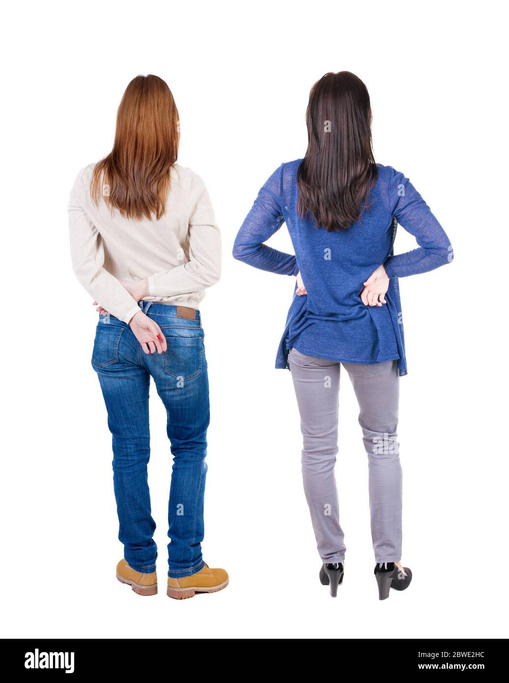Back view of two woman in sweater. Rear view people collection ...
