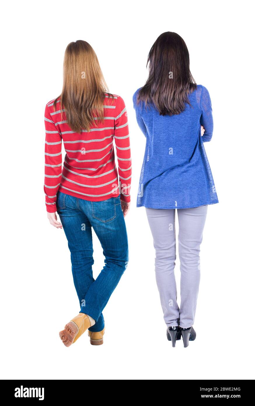 Back view of two woman in sweater. Rear view people collection ...