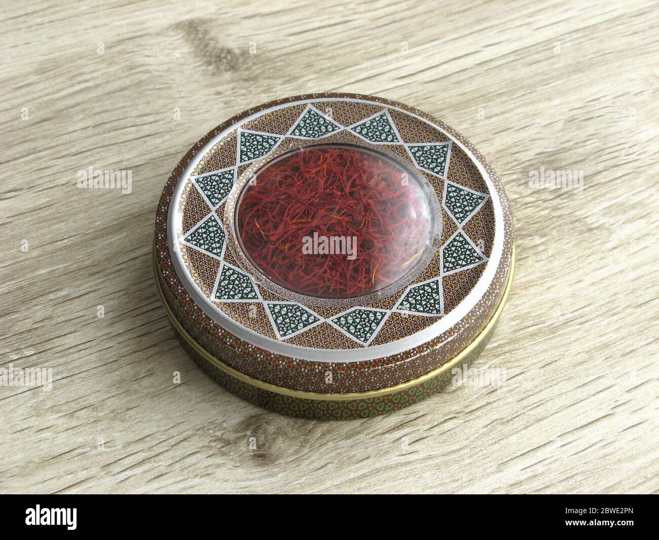 Mashhad, IRAN, 10 03 2020: Iranian saffron into handcraft box on wooden ...
