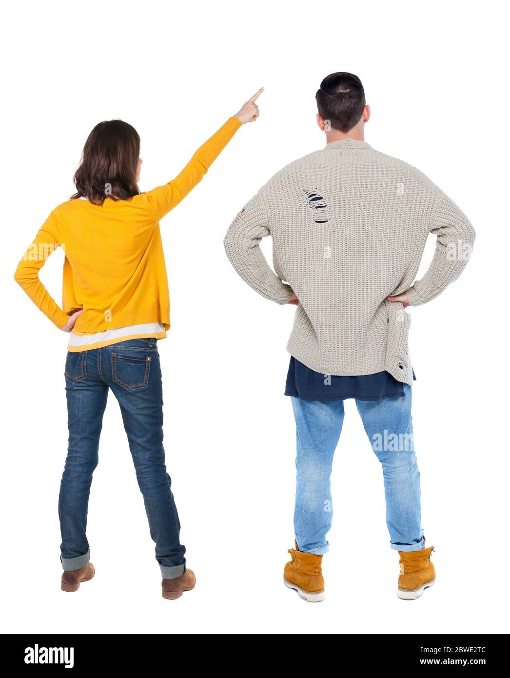 Back view of couple in sweater with mobile phone. beautiful friendly ...