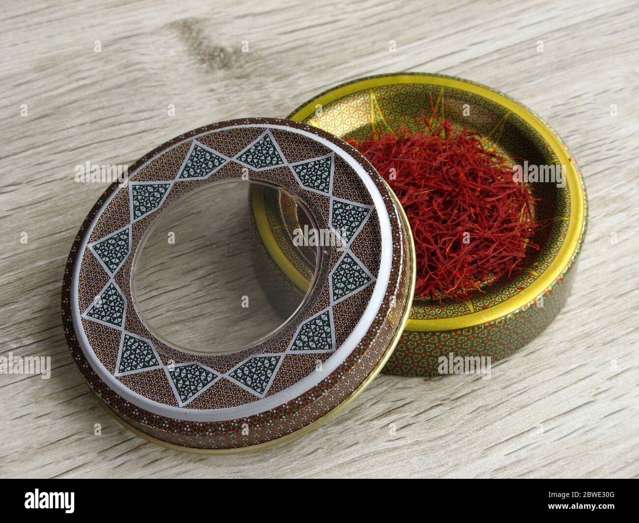 Red saffron (crocus sativus) stigmas - luxurious spice in table ...