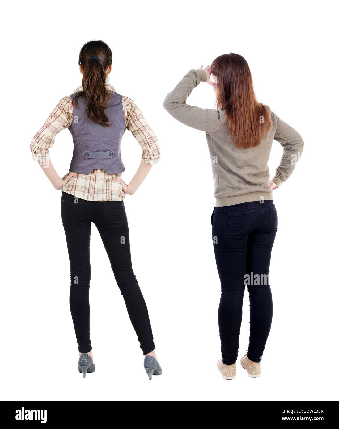 Back view of two woman in sweater. Rear view people collection ...