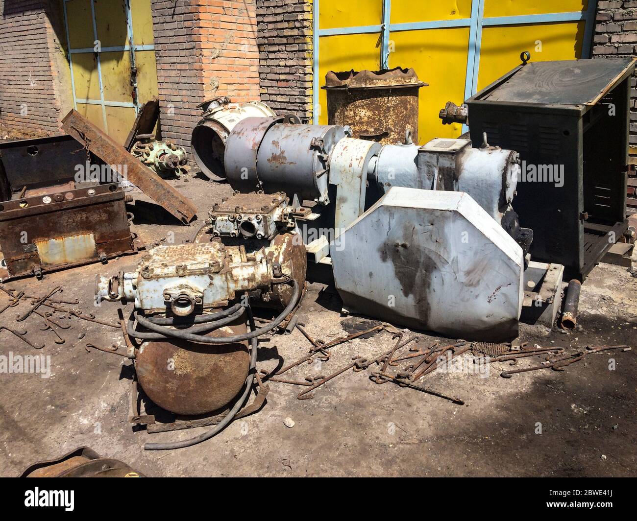 Corroded and rusted iron. Damaged factory. Unused equipment on the ...