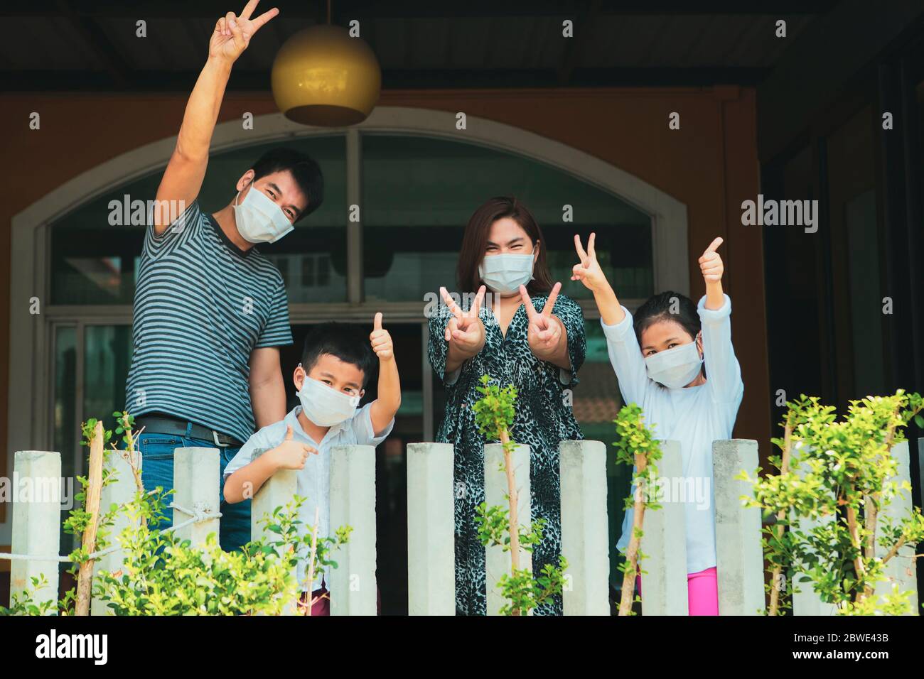 asian family quarantine at home while corona virus ,covid-19 infected ...
