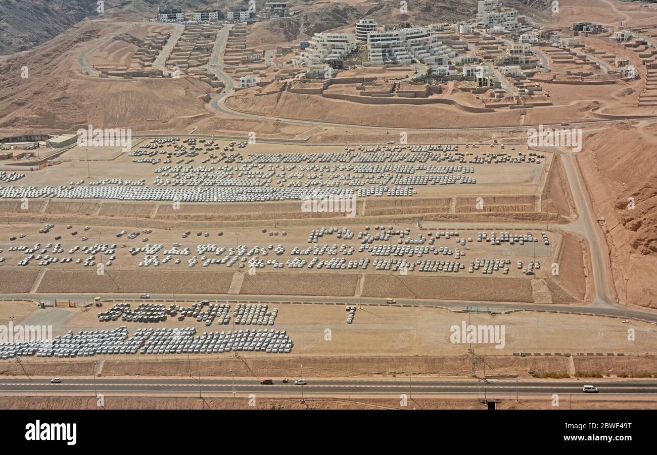 New imported cars wait in a giant lot, Aerial view - Eilat , Israel ...