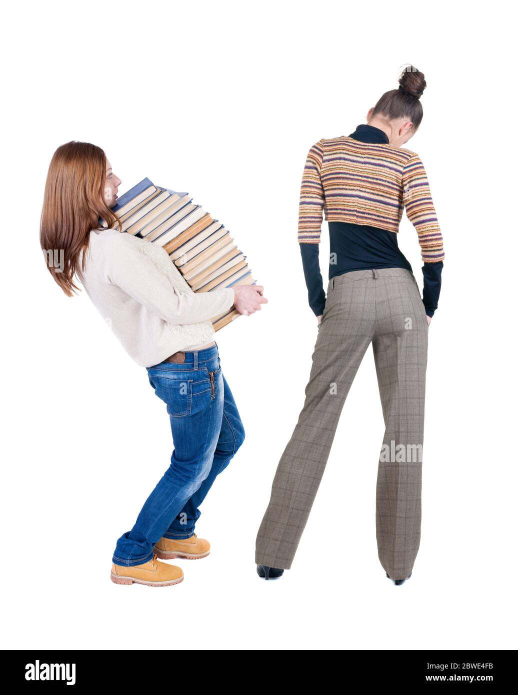 Back view of two woman in sweater. Rear view people collection ...