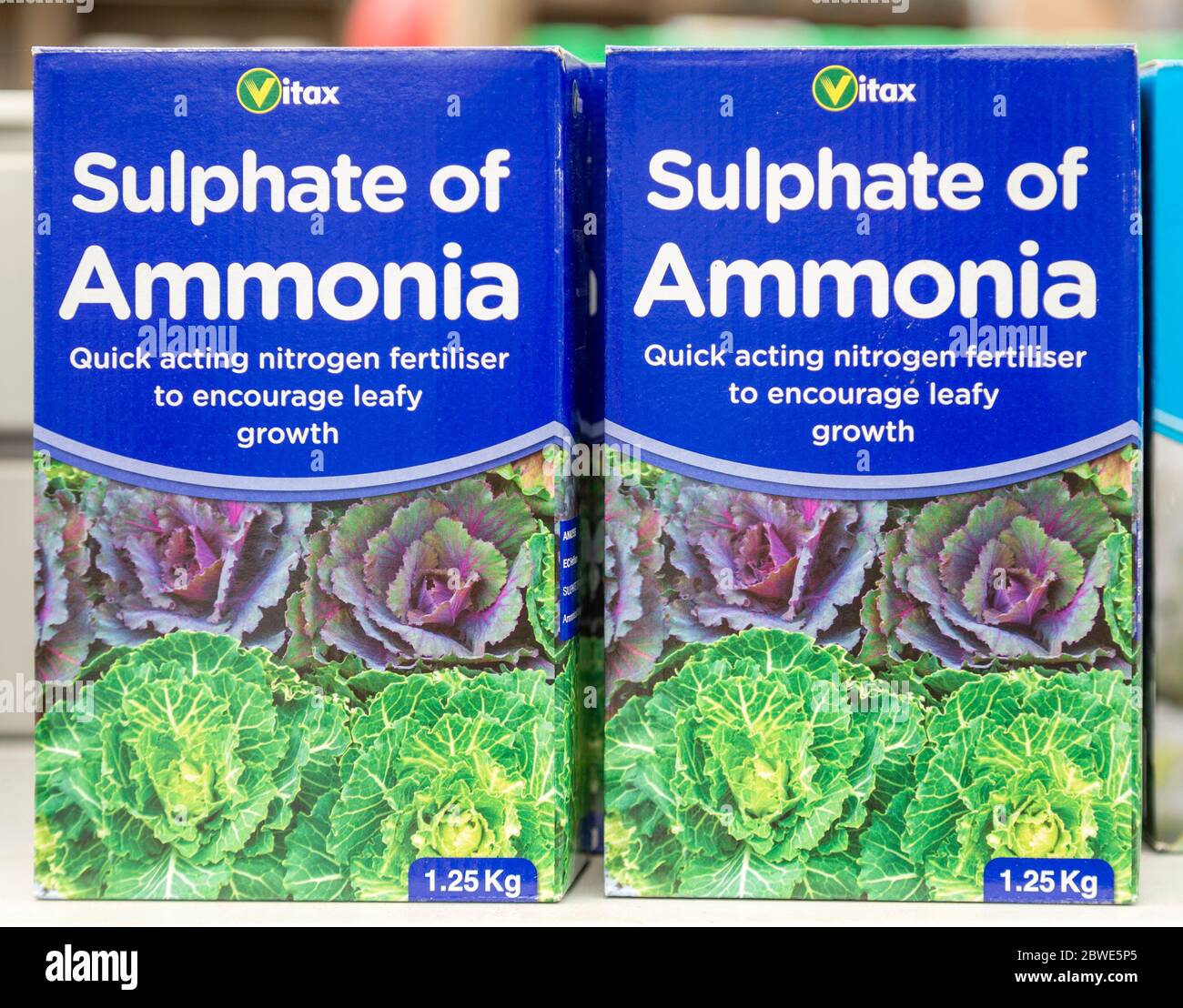Cardboard boxes of Vitax Sulphate of Ammonia on shelf display in garden ...
