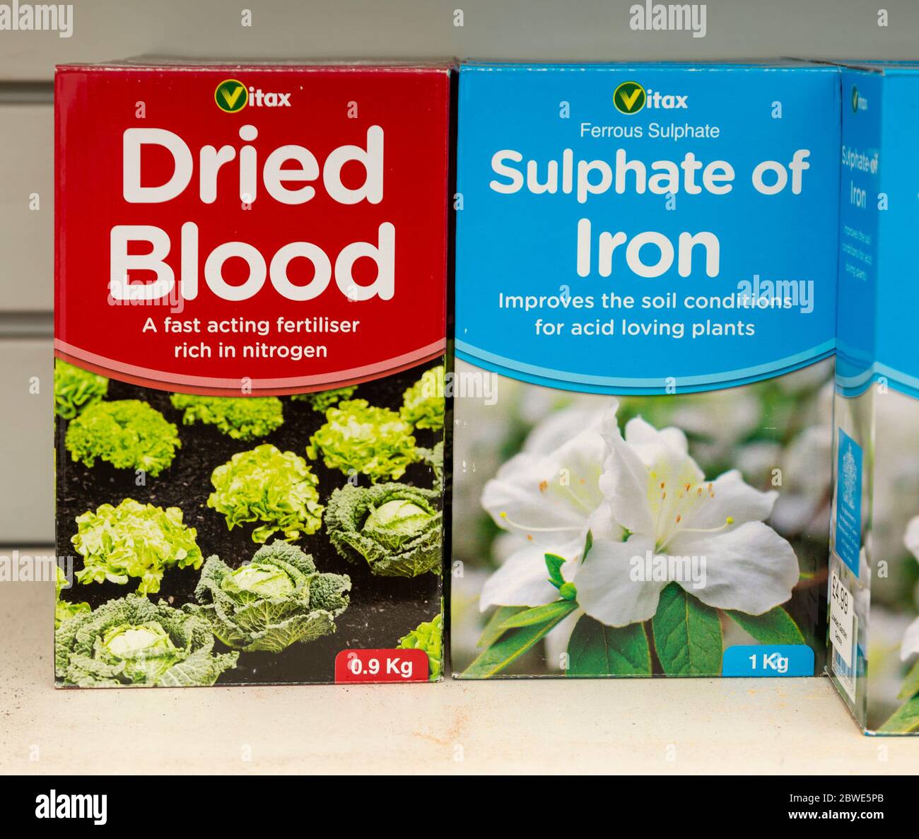 Cardboard boxes of Vitax Dried Blood and Sulphate of Iron on shelf ...