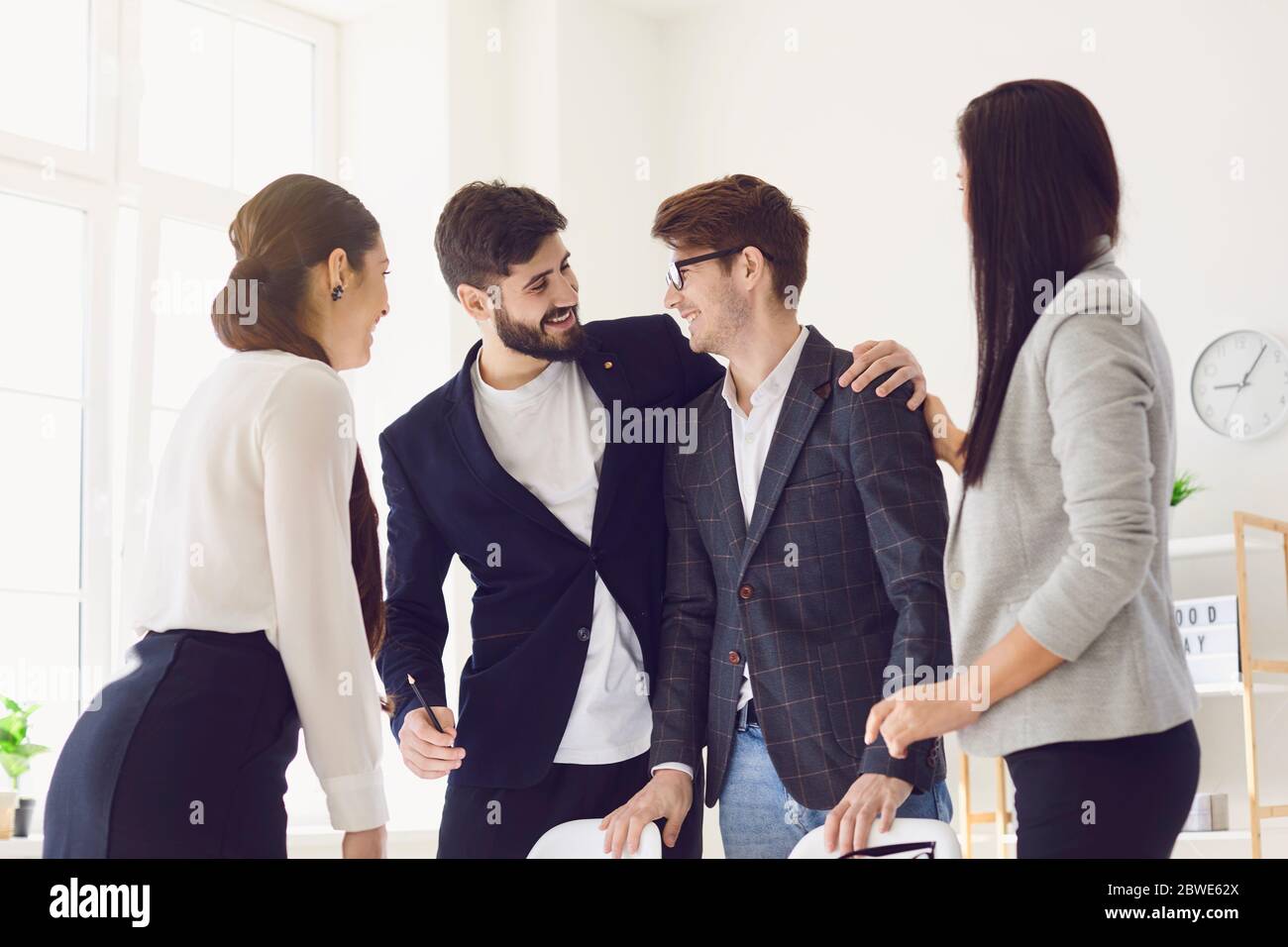 Positive smile laugh friendly work hi-res stock photography and images ...