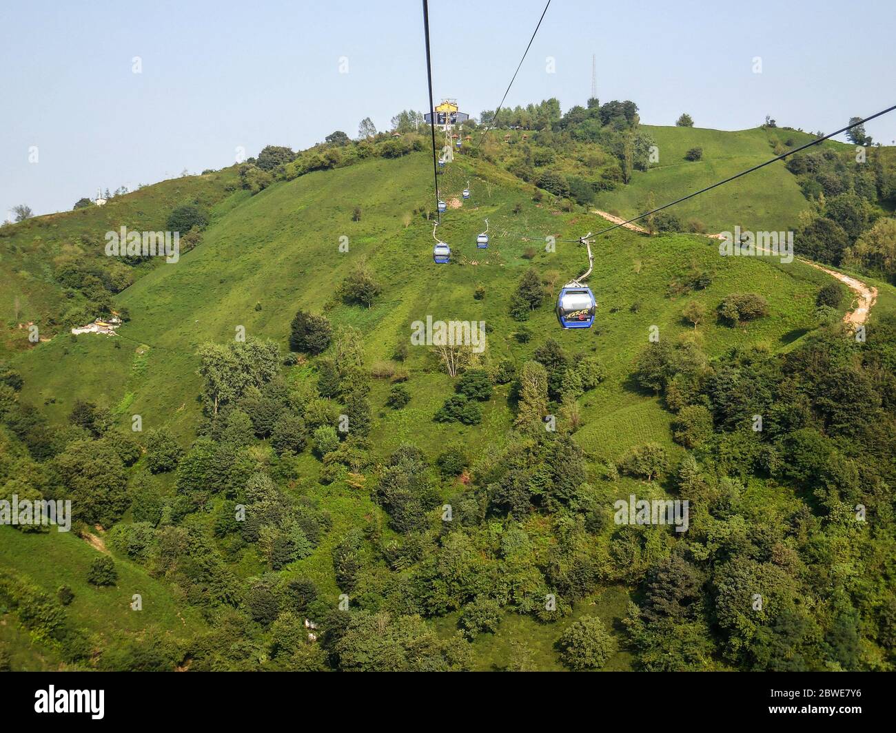 iran, gilan, rasht 06 06 2019: Aerial lift passes through the mountains ...