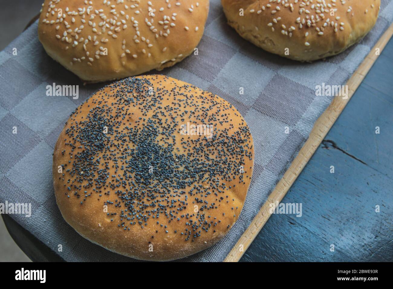Homemade burger bread with poppy seeds and sesame Stock Photo - Alamy