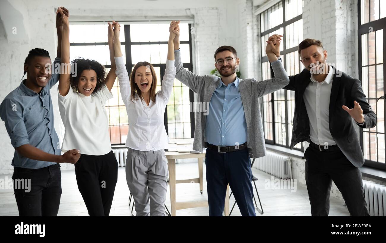 Diverse hands celebrating hi-res stock photography and images - Alamy