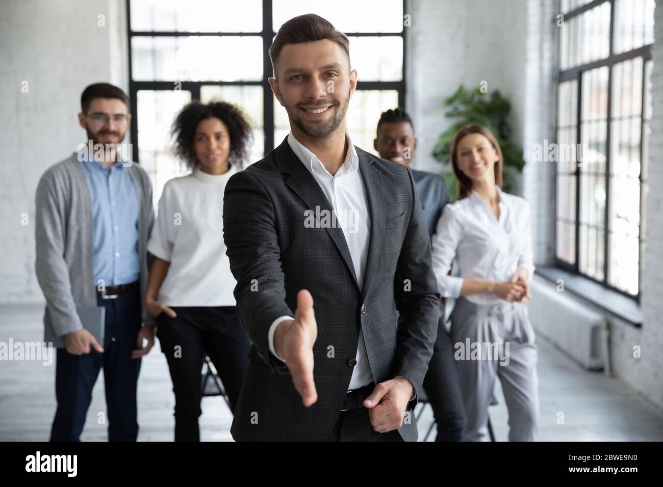 Businessman offering shake hand hi-res stock photography and images - Alamy