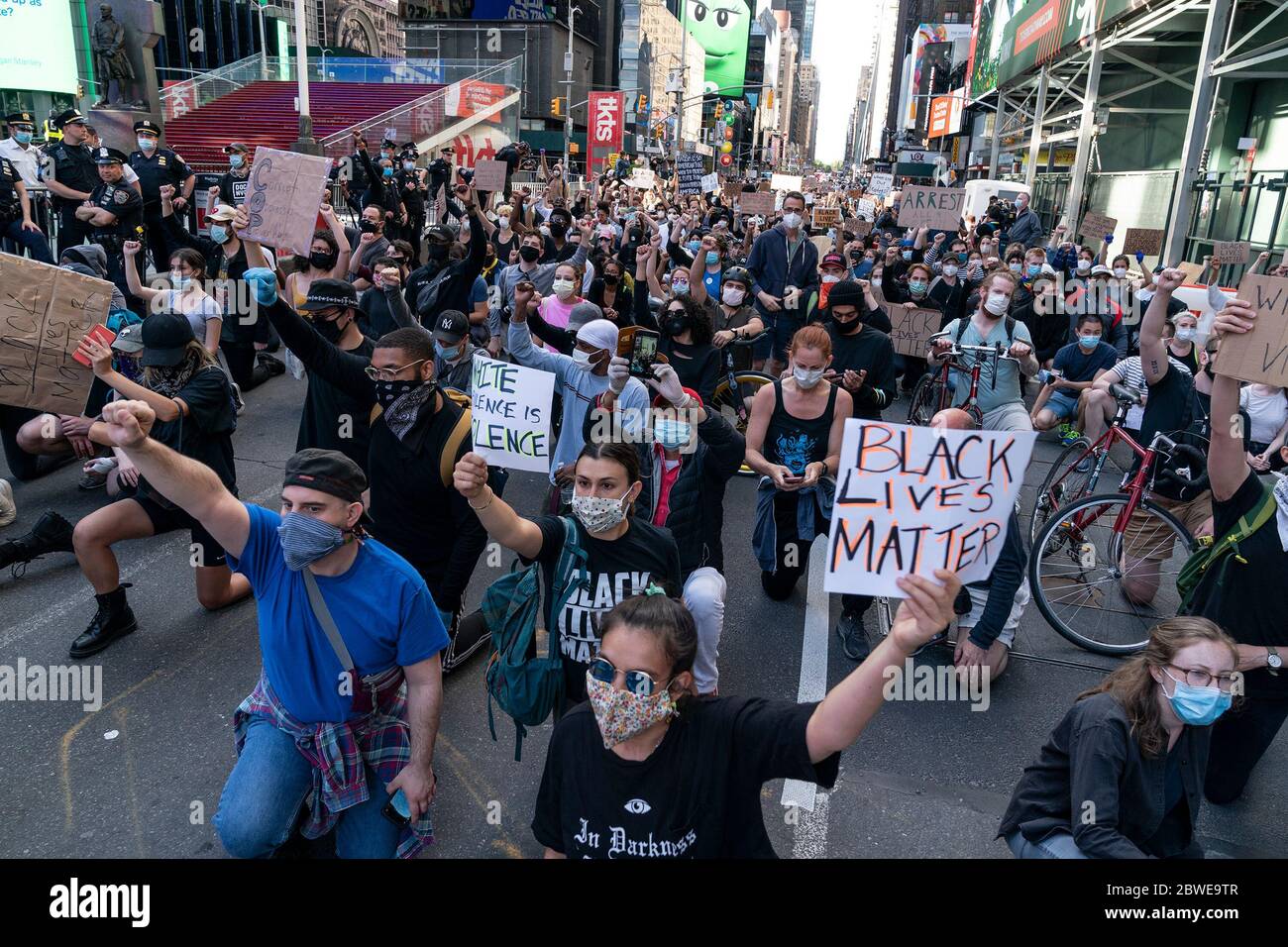 Kneeling protesters in times square hi-res stock photography and images ...