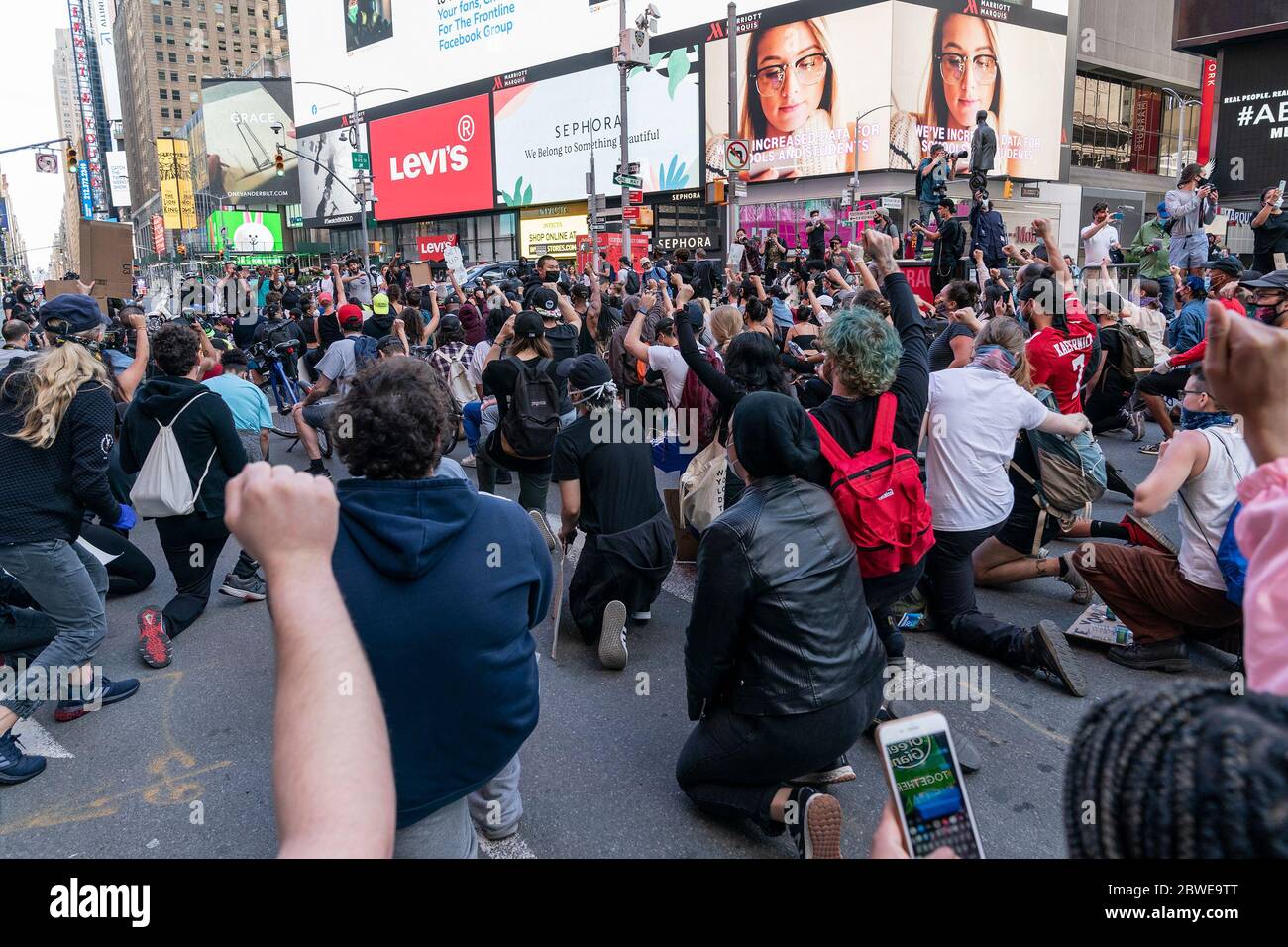 Kneeling protesters in times square hi-res stock photography and images ...