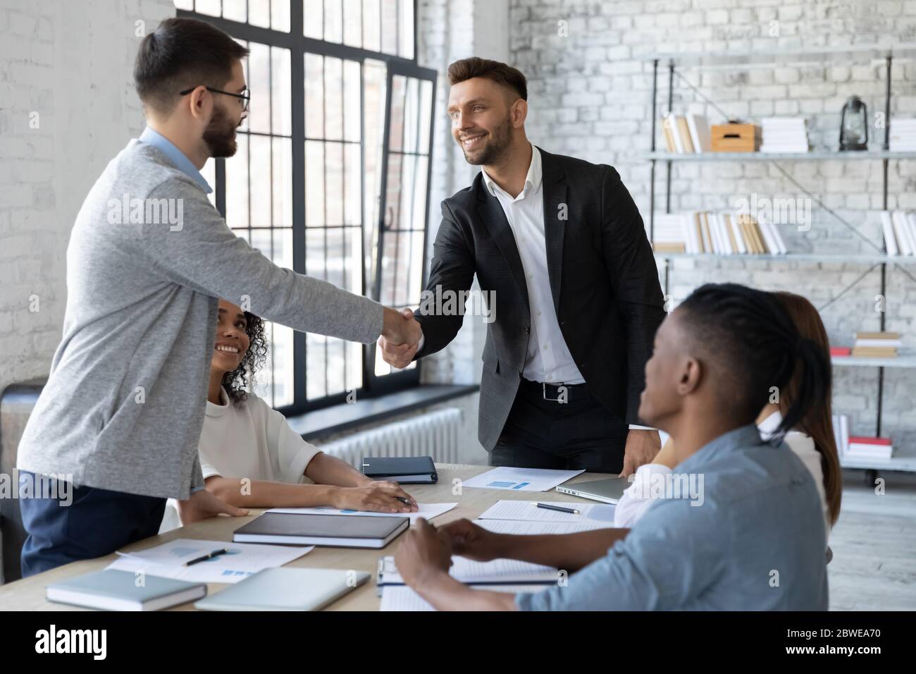 Diverse man woman business partners hi-res stock photography and images ...